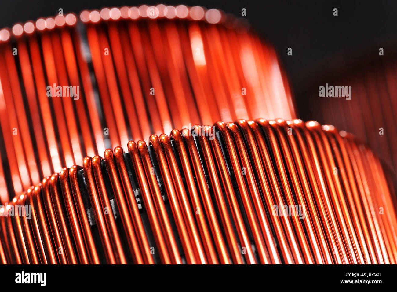 two copper coils Stock Photo - Alamy