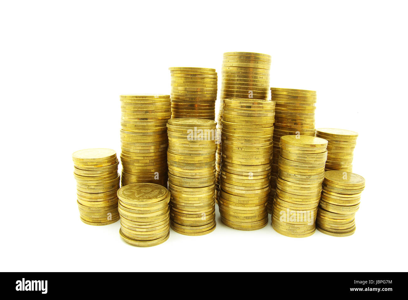 Coin pile isolated on white background Stock Photo - Alamy