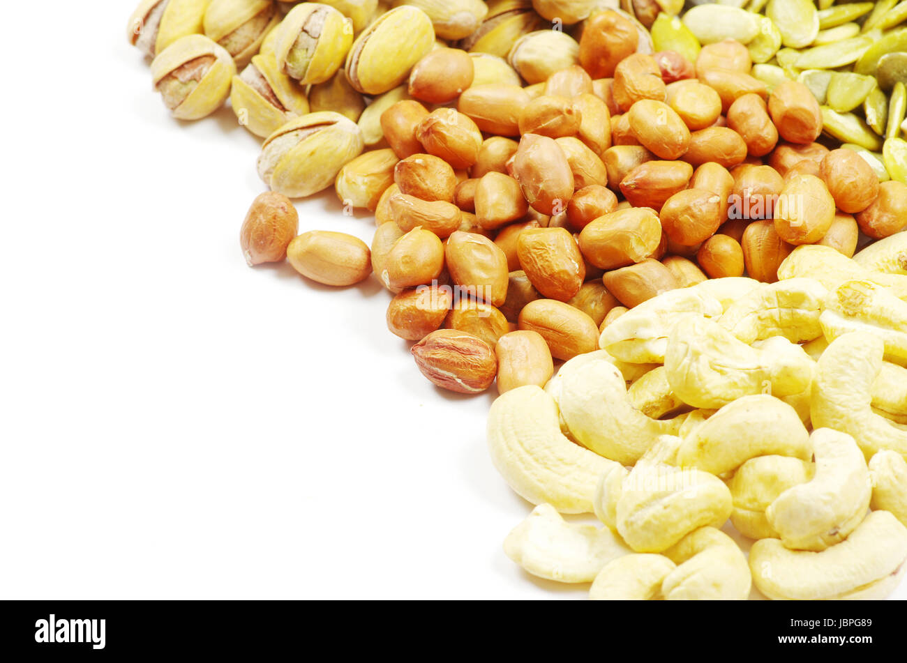 Assorted mixed nuts on white background Stock Photo - Alamy
