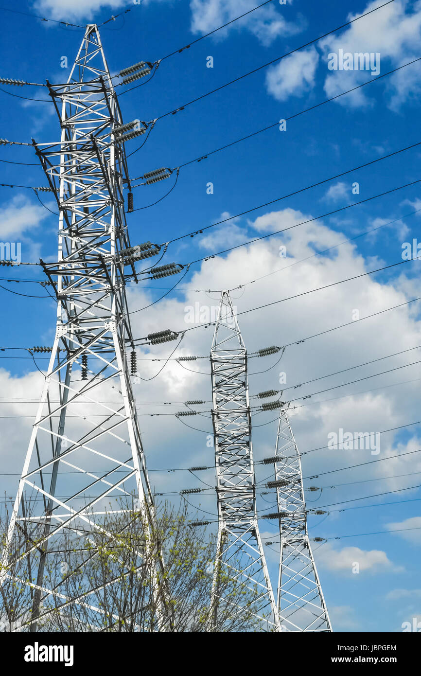 High voltage electrical power lines on sky background Stock Photo - Alamy