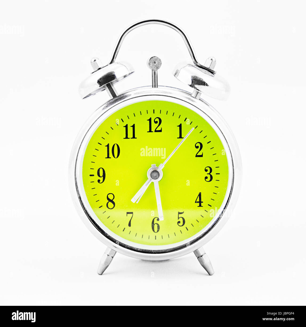 Alarm clock on white background. Showing time twenty eight minutes past ...