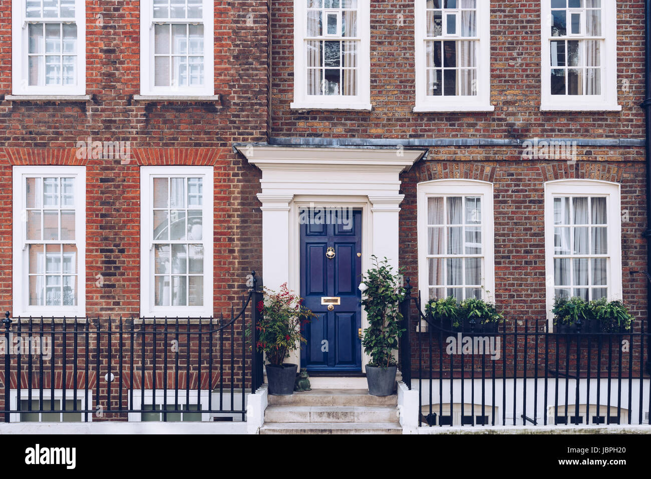 Typical street scene in the central London district with familiar ...