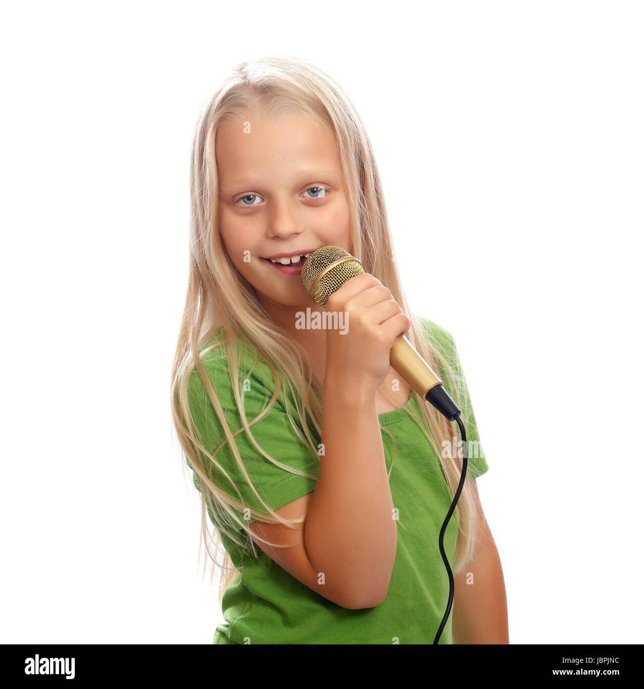 A young female singer with a golden microphone Stock Photo - Alamy