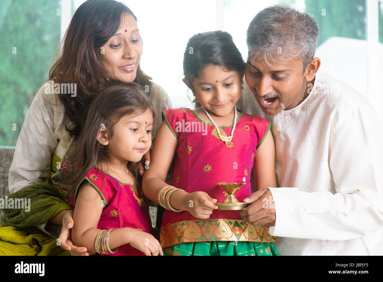Deepavali, indian family hi-res stock photography and images - Alamy