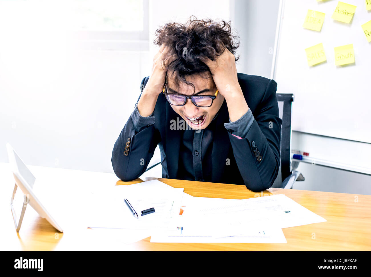 busy and headache person, unsuccessful businessman Stock Photo - Alamy