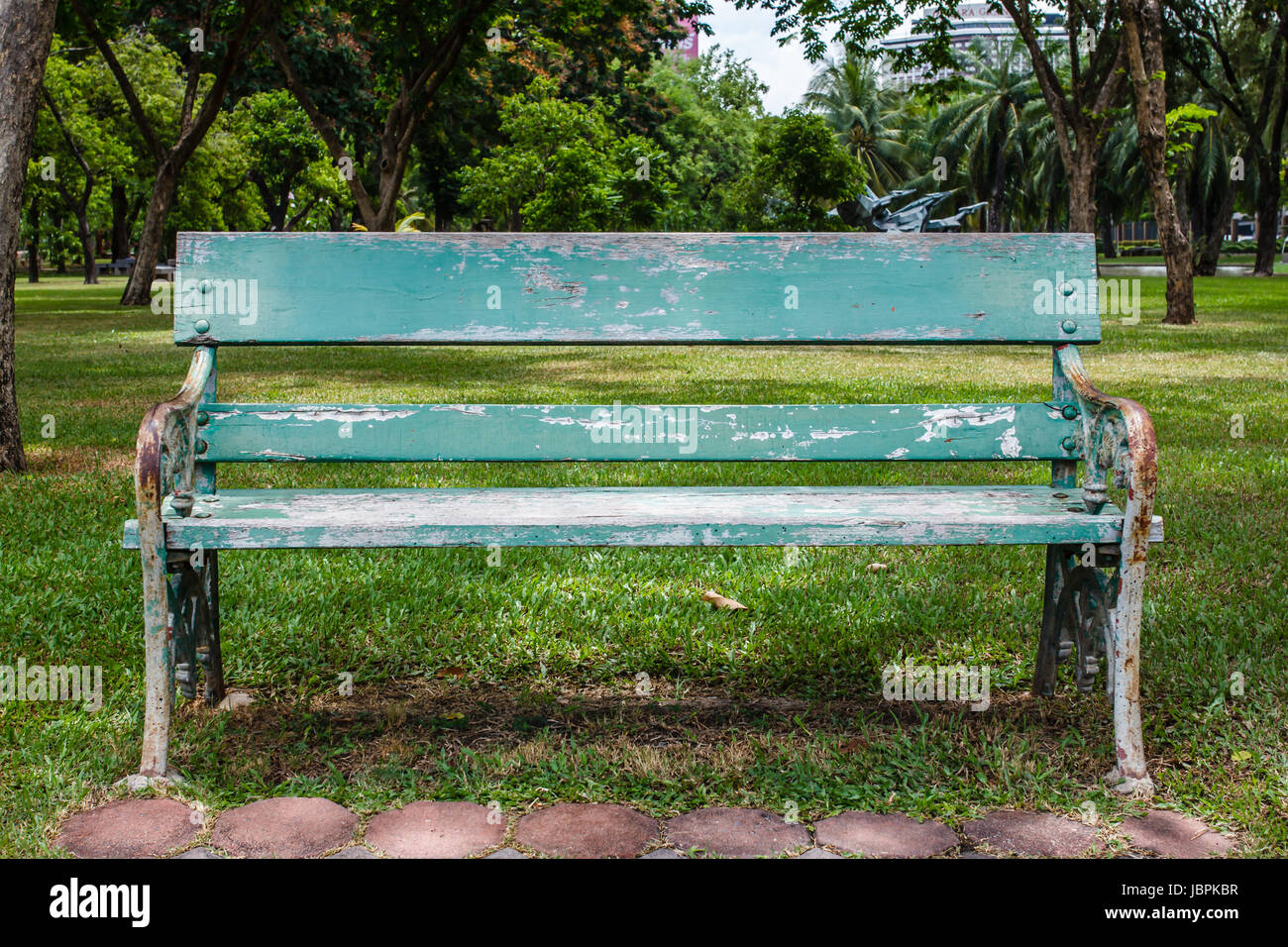 wooden park bench at a park Stock Photo - Alamy