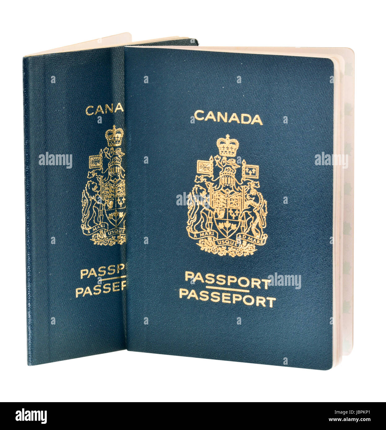 Two Canadian passports isolated on white Stock Photo - Alamy