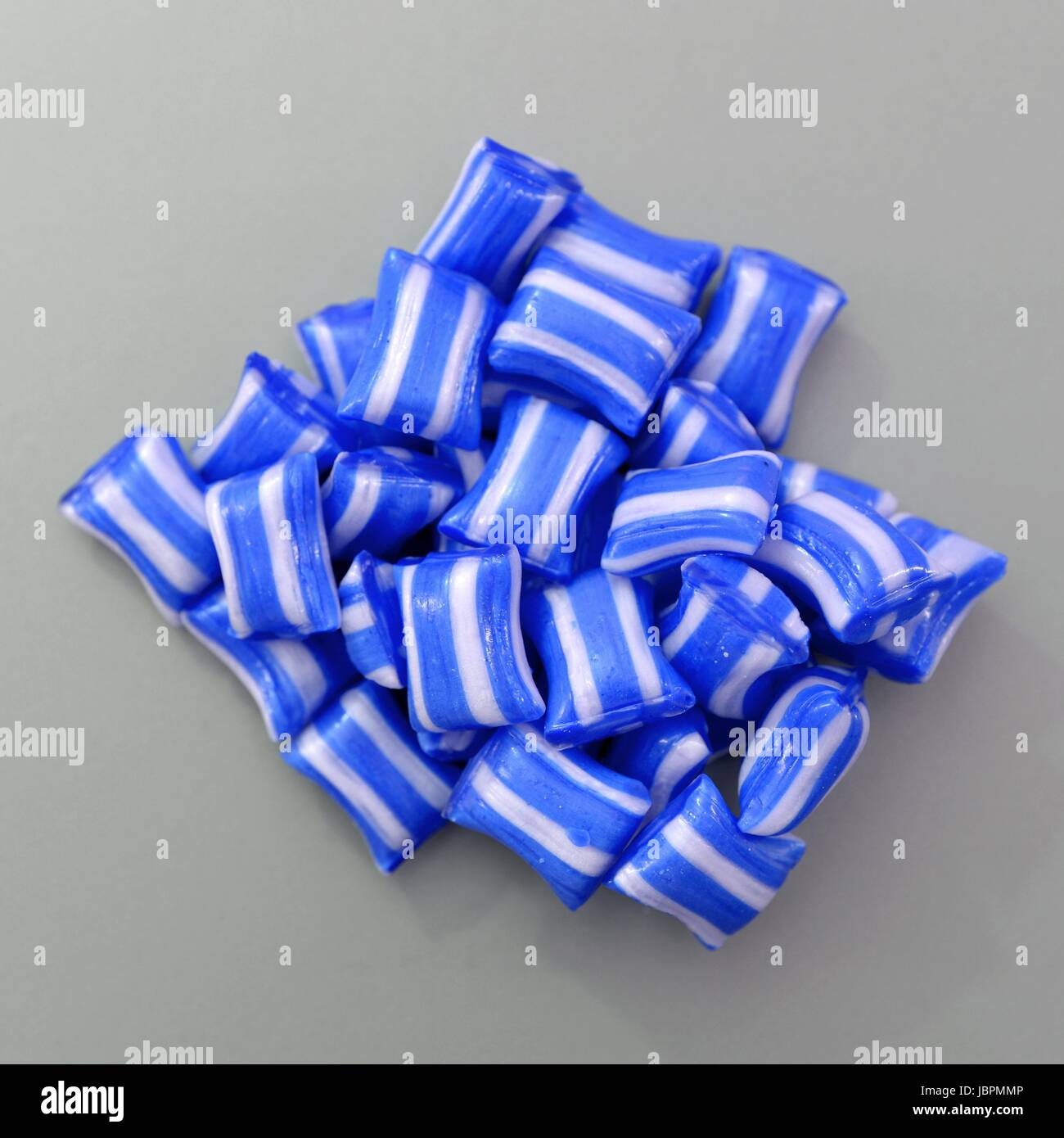 Green and white hard boiled sweets hi-res stock photography and images ...