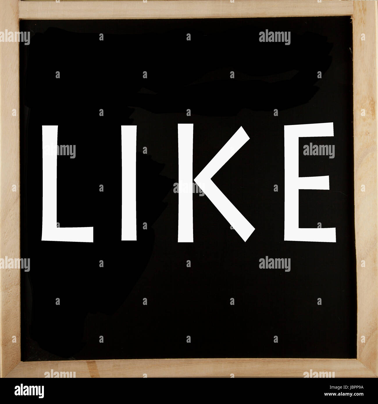 Word "Like" written with chalk over a blackboard Stock Photo - Alamy
