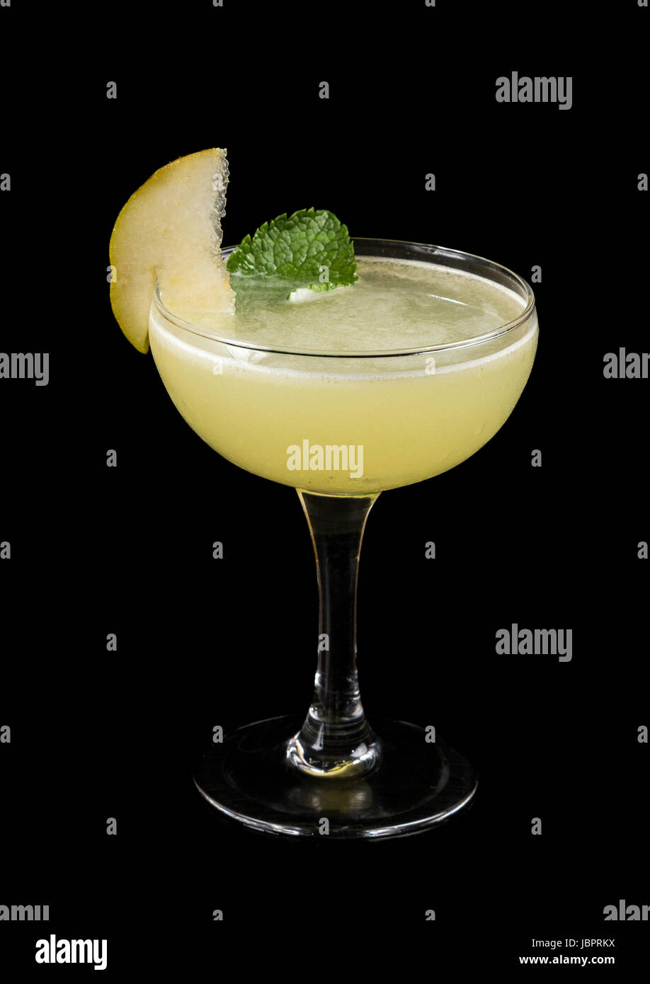 mix alcohol cocktail in glass on black background Stock Photo - Alamy