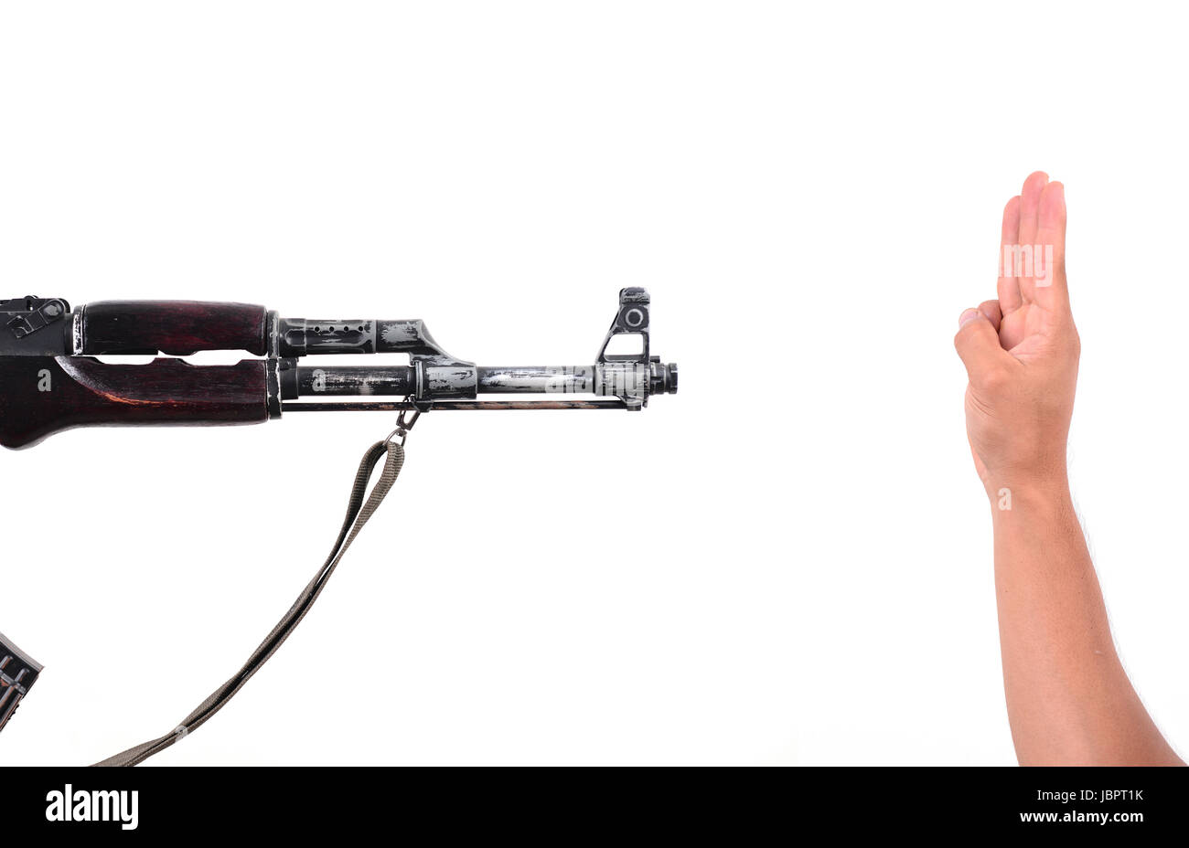 man show 3 finger for anti dictator in thailand Stock Photo - Alamy