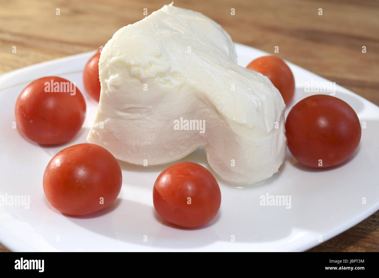 Italian food : mozzarella pachino tomatoes and basil Stock Photo - Alamy