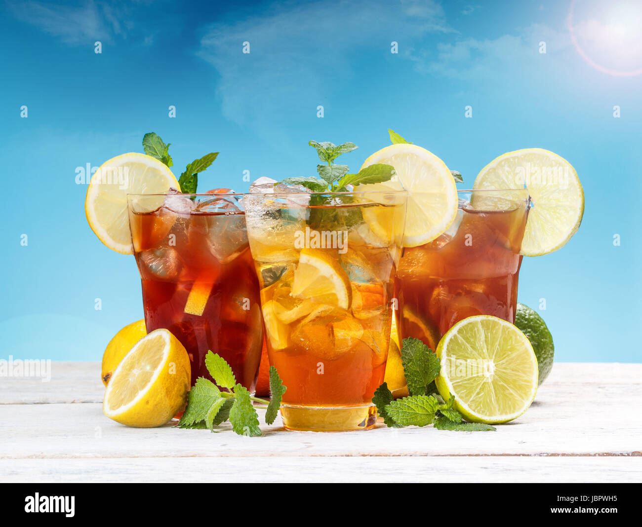 Fresh and cold ice tea with sliced lemon and mint Stock Photo - Alamy