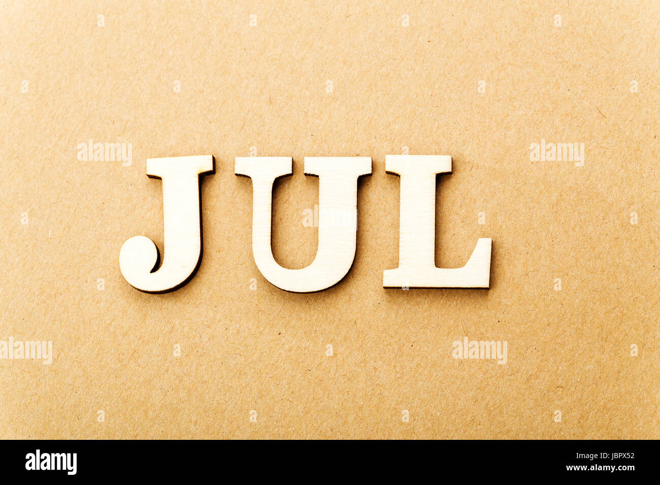Wooden text for July Stock Photo - Alamy