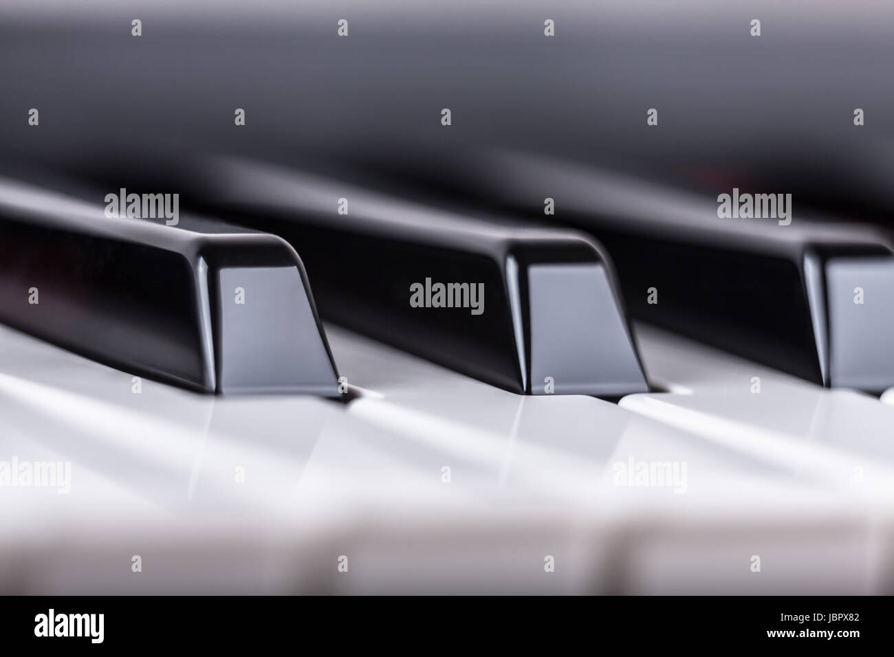 Detail of piano musical instrument keyboard Stock Photo - Alamy