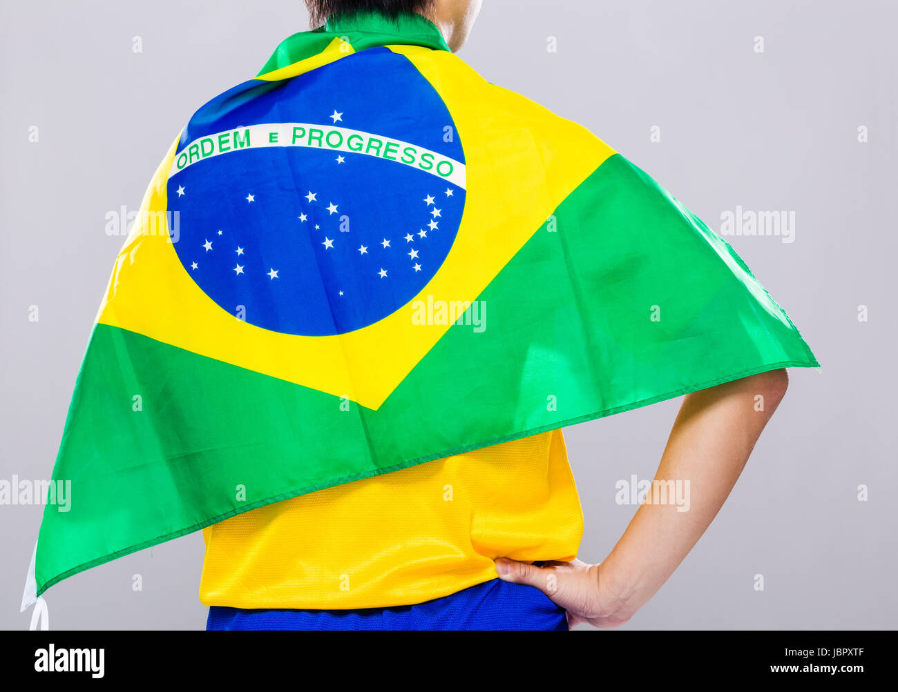 Football player with Brazil flag Stock Photo - Alamy