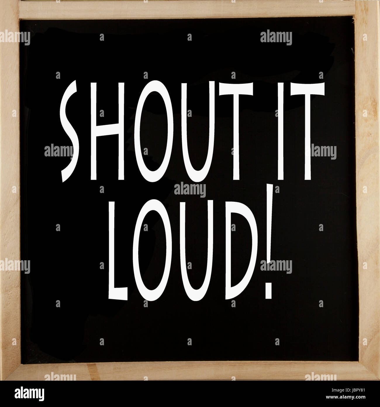 Words "Shout it loud" written with chalk over a blackboard Stock Photo ...