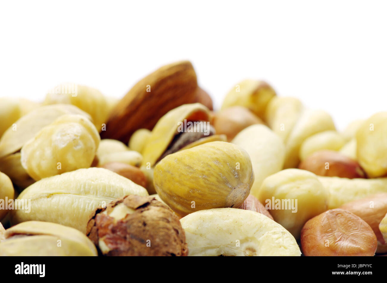 Assorted mixed nuts on white background Stock Photo - Alamy