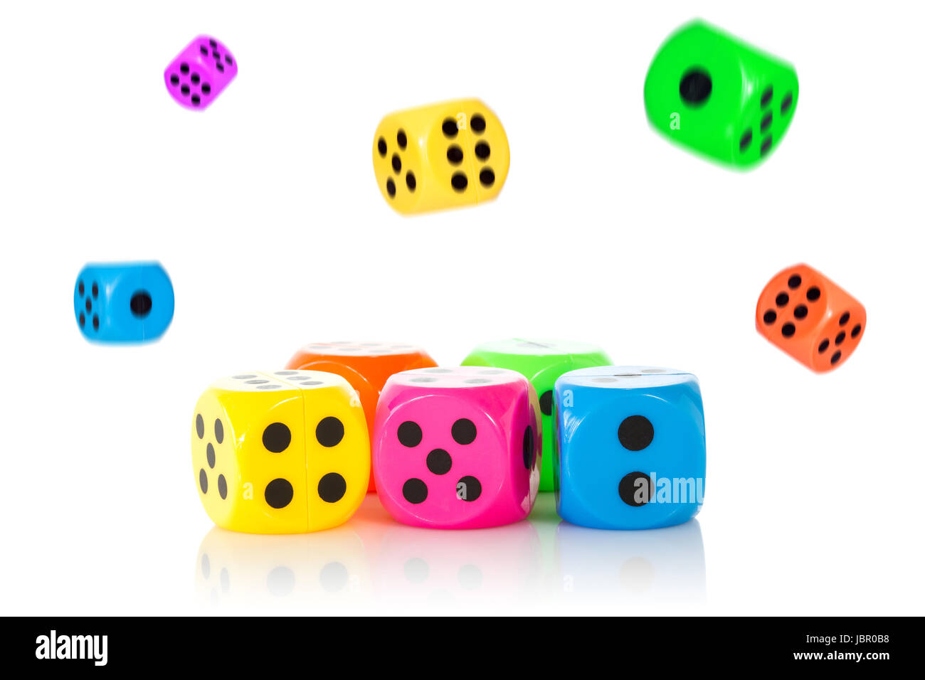 Pile of falling dices with the front ones in focus. Isolated on white ...