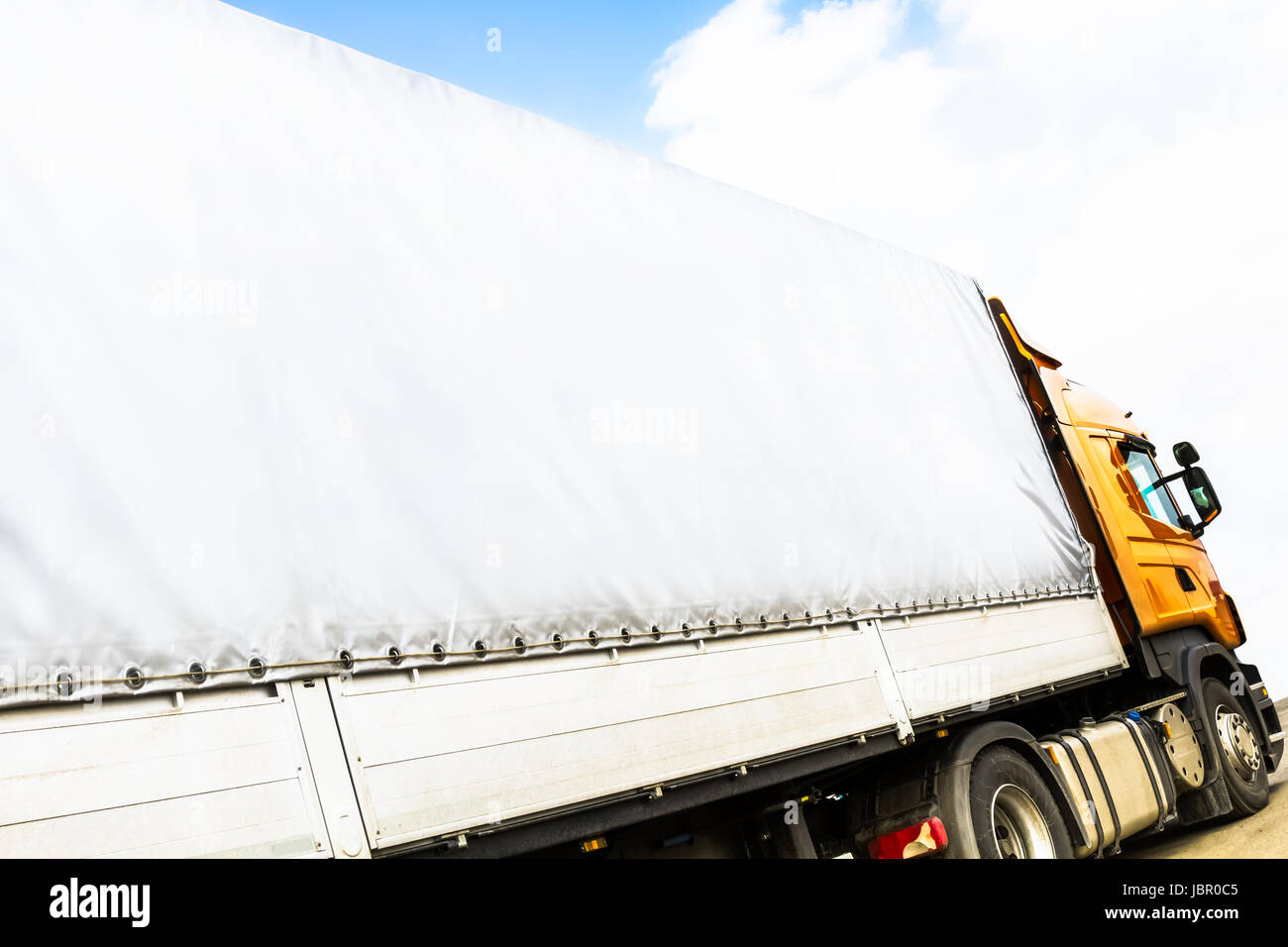 Truck. View to right side from low angle Stock Photo - Alamy