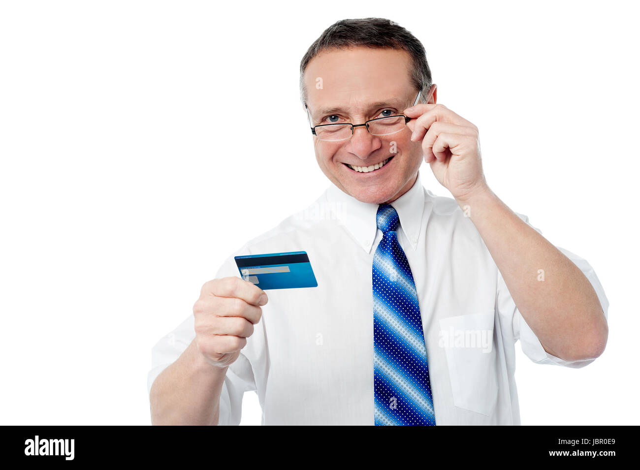 Smiling executive showing credit card Stock Photo - Alamy