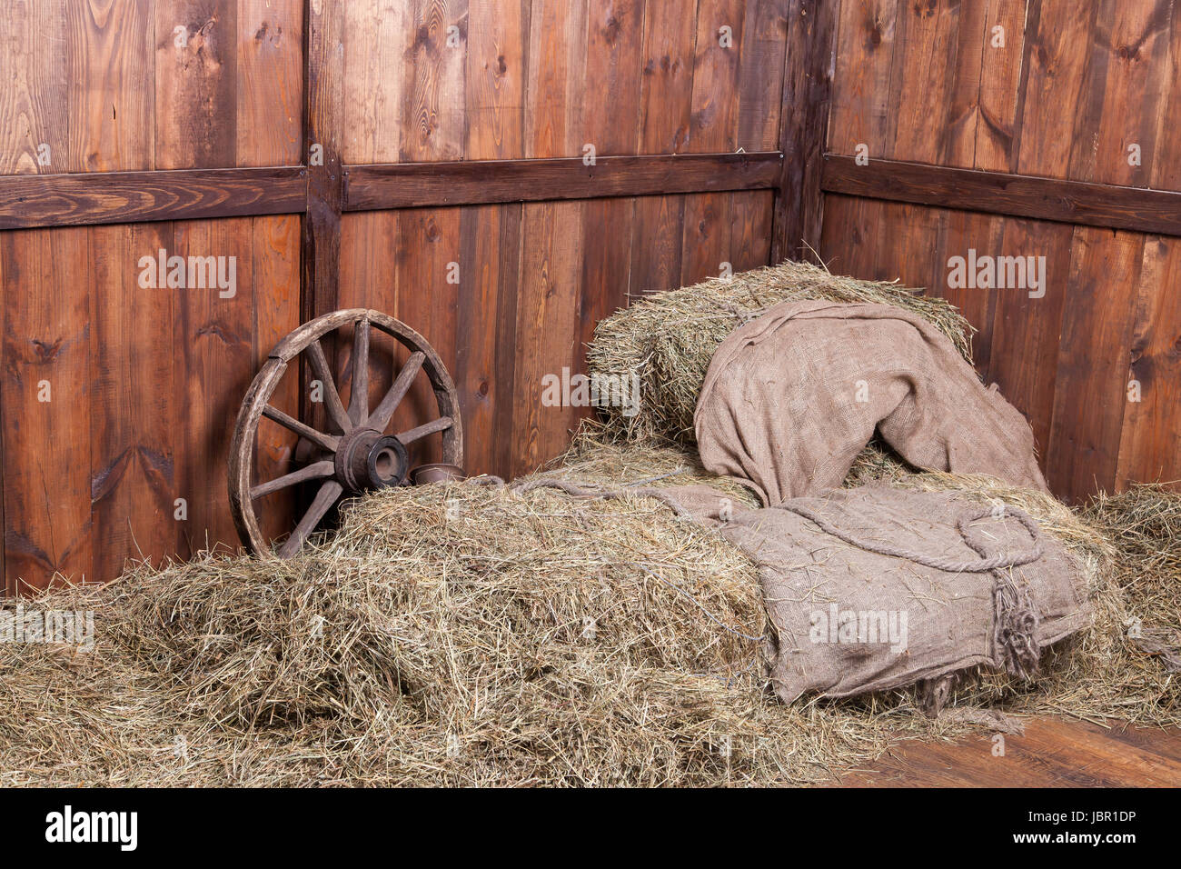 Wood and hay background inside rural barn Stock Photo - Alamy
