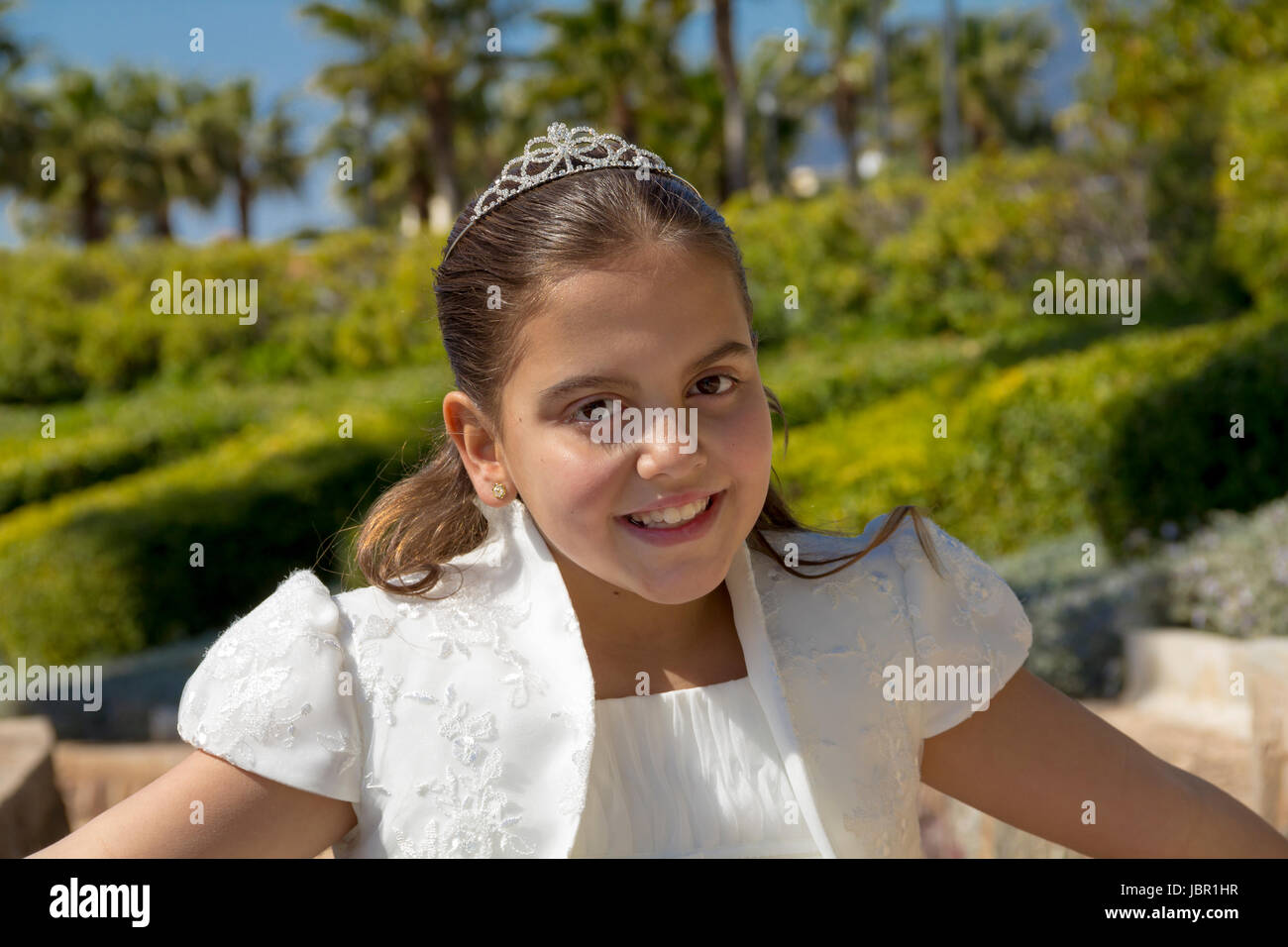 A young girl celebrating her First Holy Communion Stock Photo - Alamy