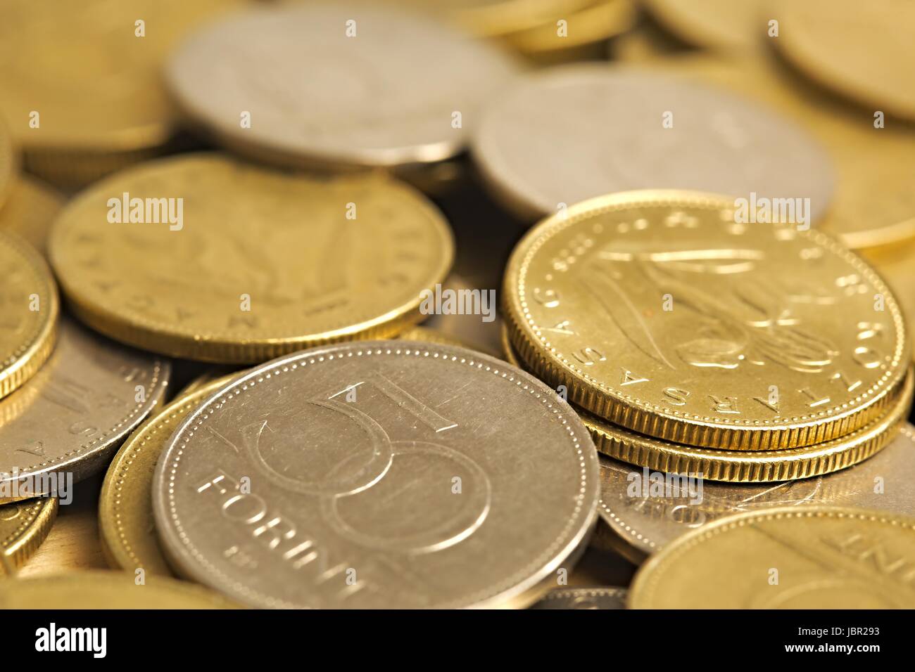 Pile of coins close up Stock Photo - Alamy