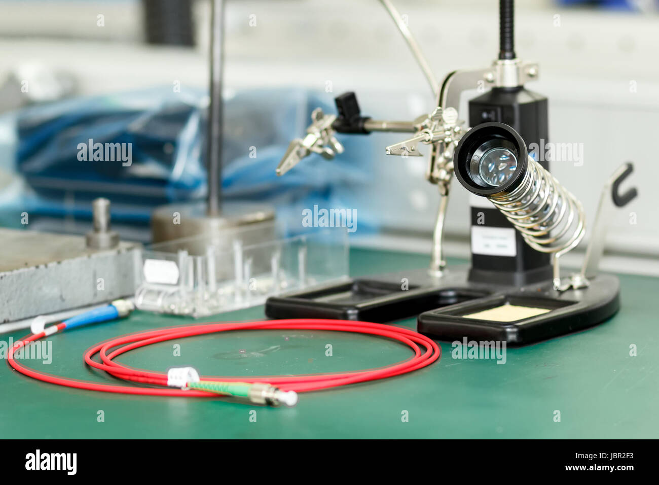 photo of electronics equipment assembly workplace with necessary tools ...