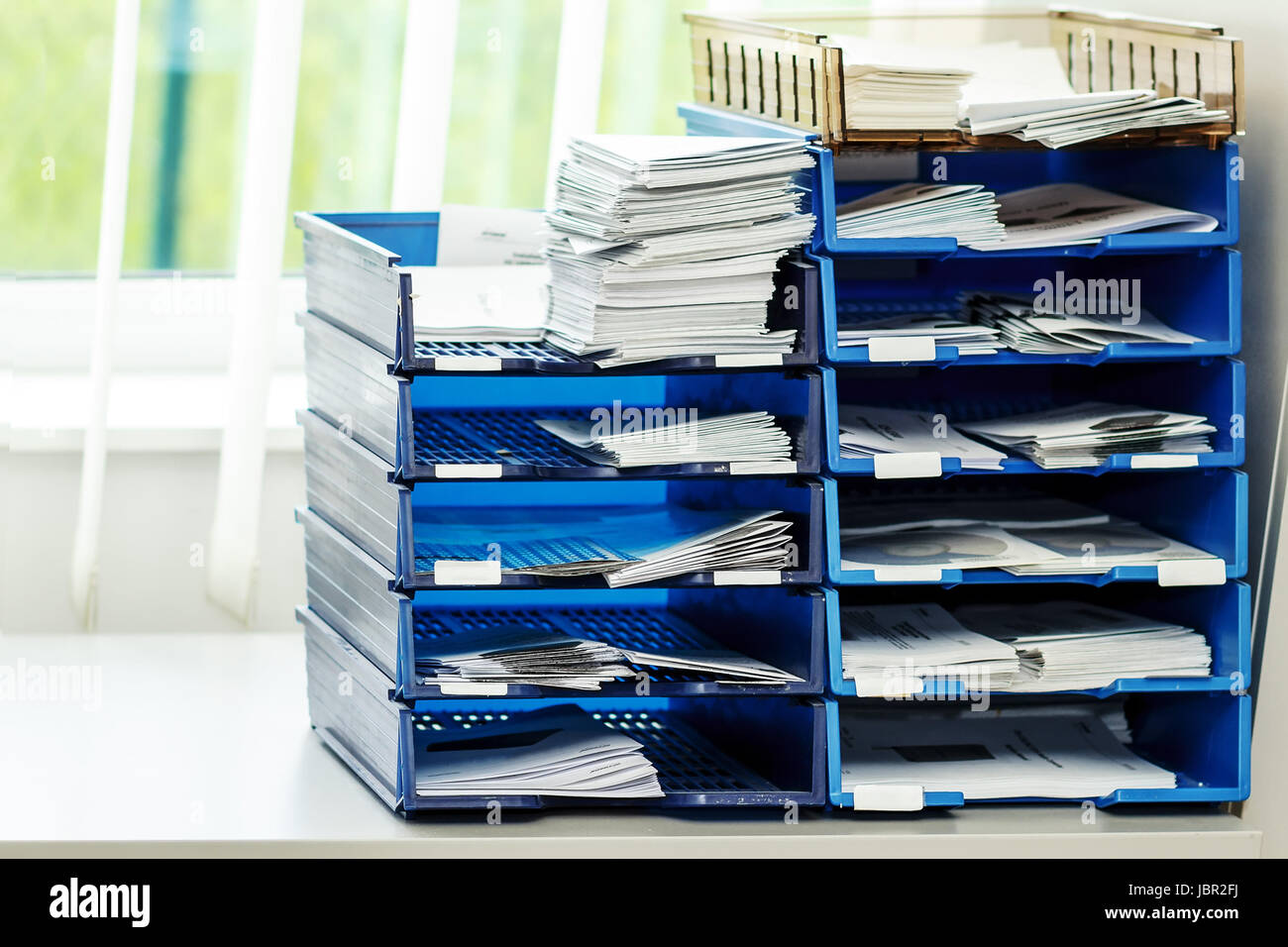 documents and projects file folders on the shelves at office Stock ...
