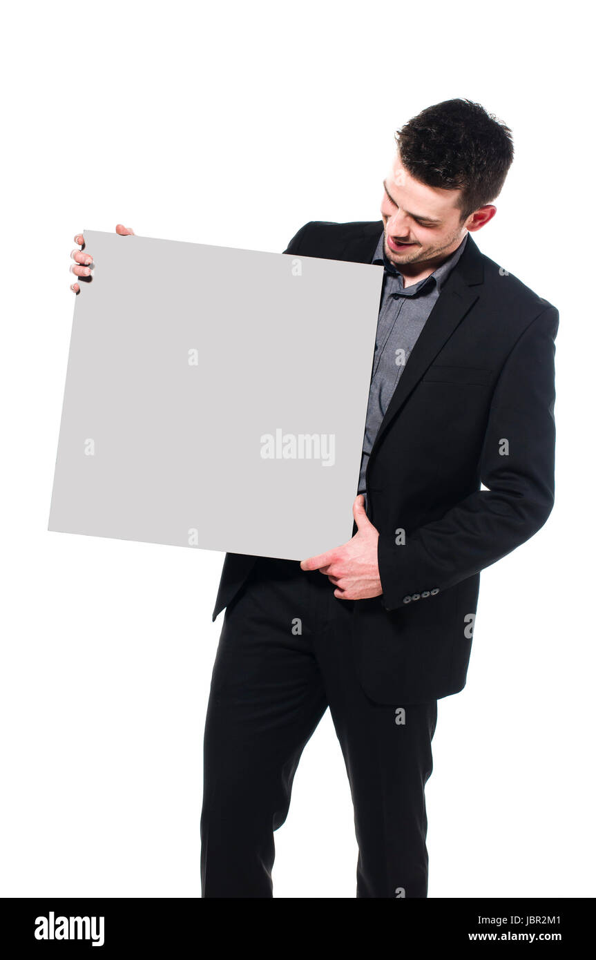 Smart Businessman holding up blank sign, isolated on white Stock Photo ...