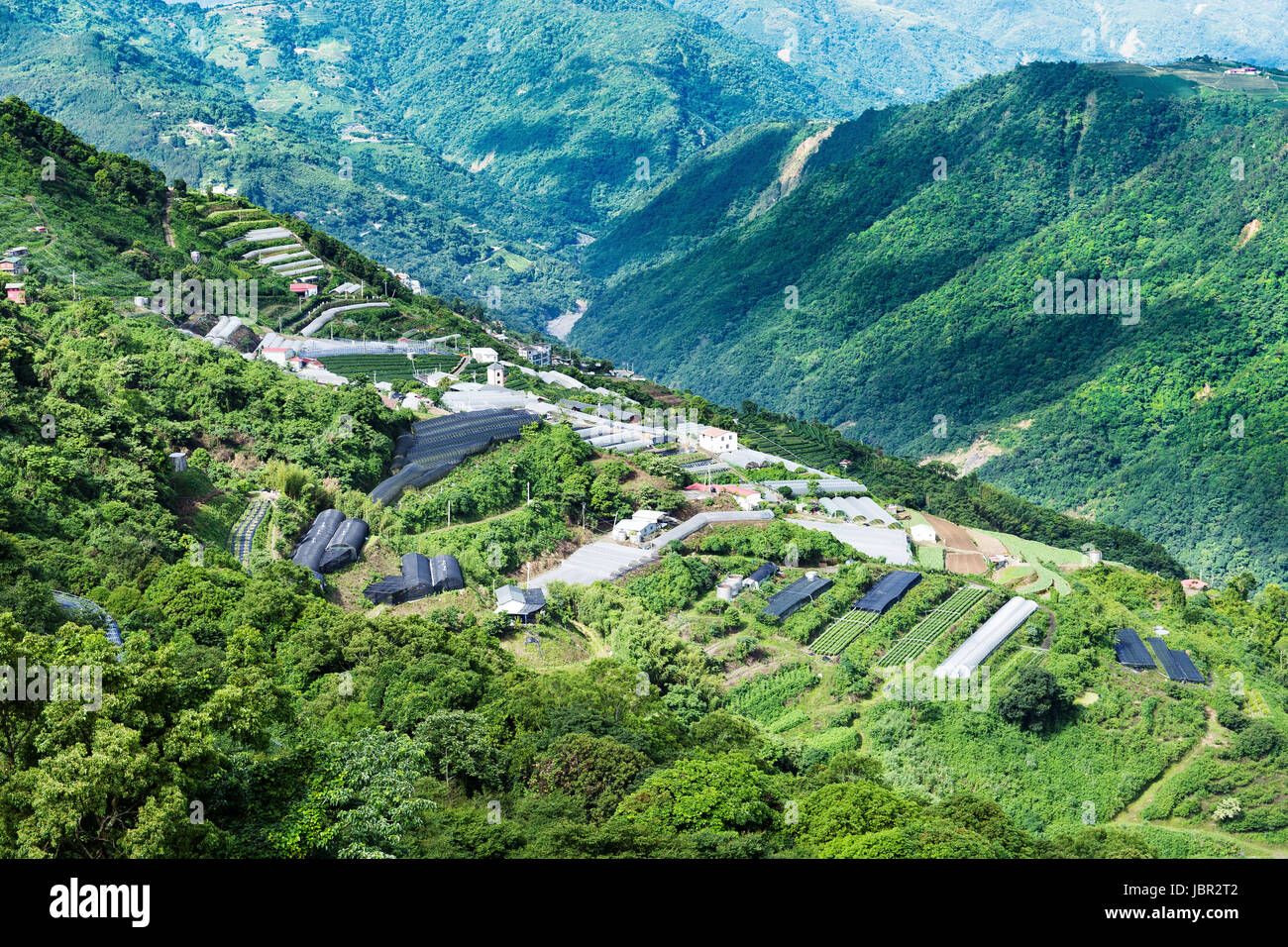 Farm on mountain Stock Photo - Alamy