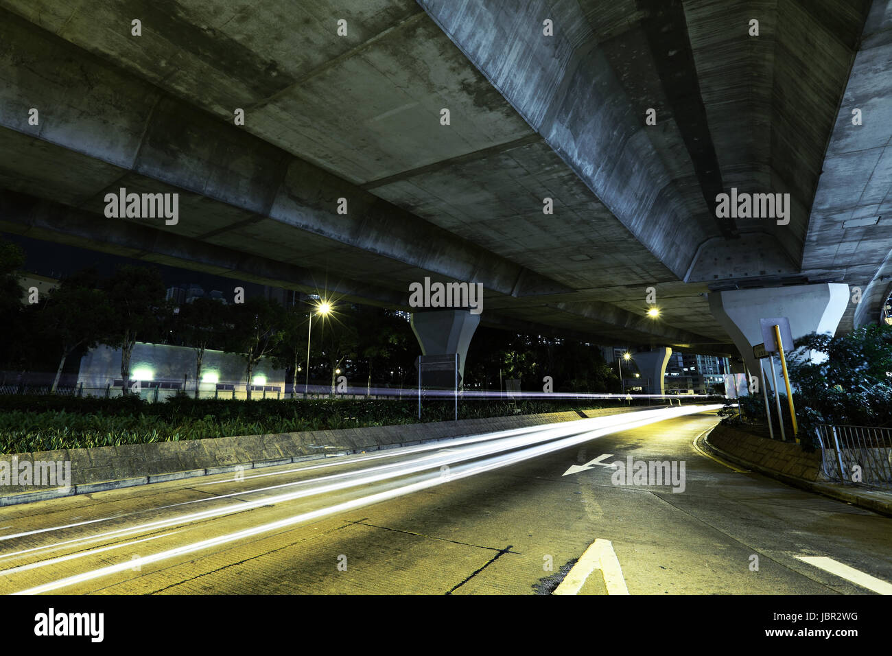 Car light trail under highway Stock Photo - Alamy