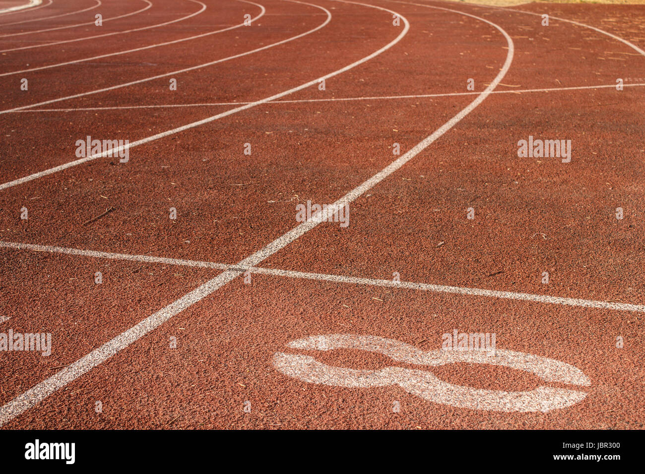 number on running track Stock Photo - Alamy
