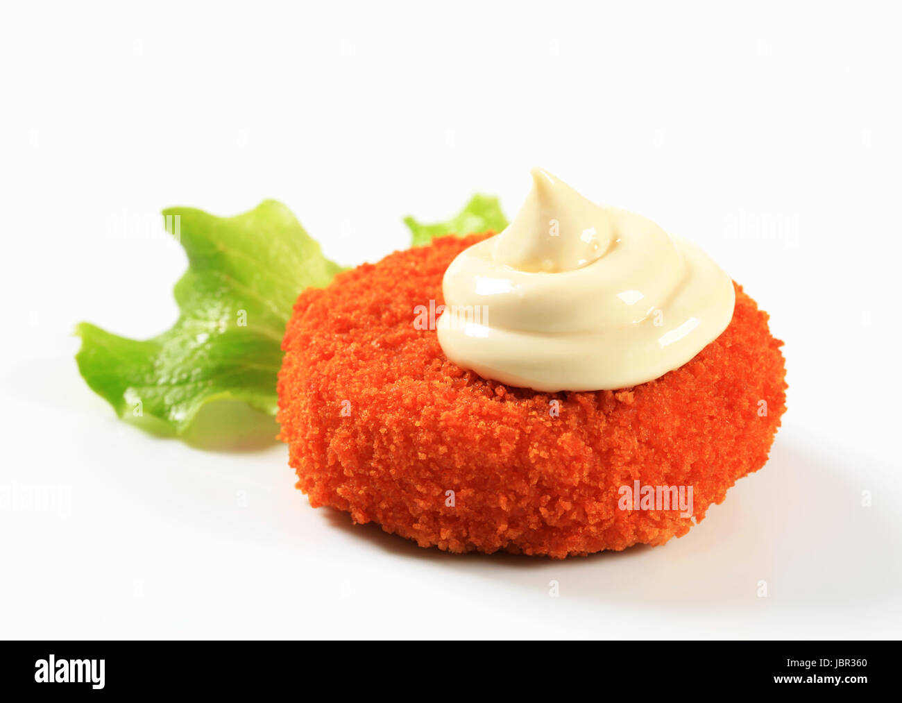 Fried breaded patty with mayonnaise Stock Photo - Alamy