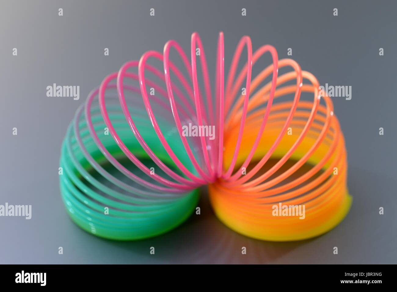 A close up shot of a slinky toy Stock Photo - Alamy