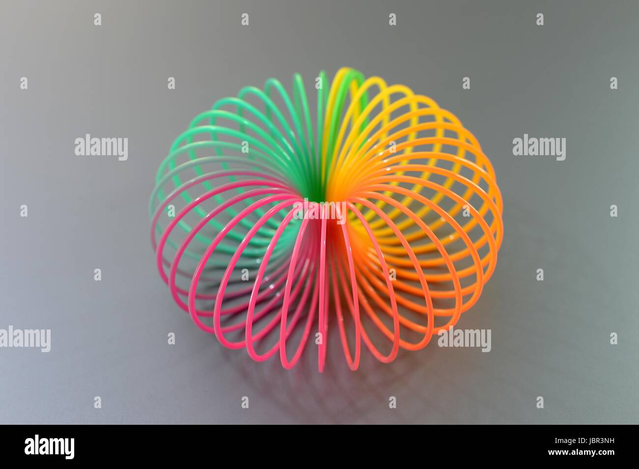 A close up shot of a slinky toy Stock Photo - Alamy