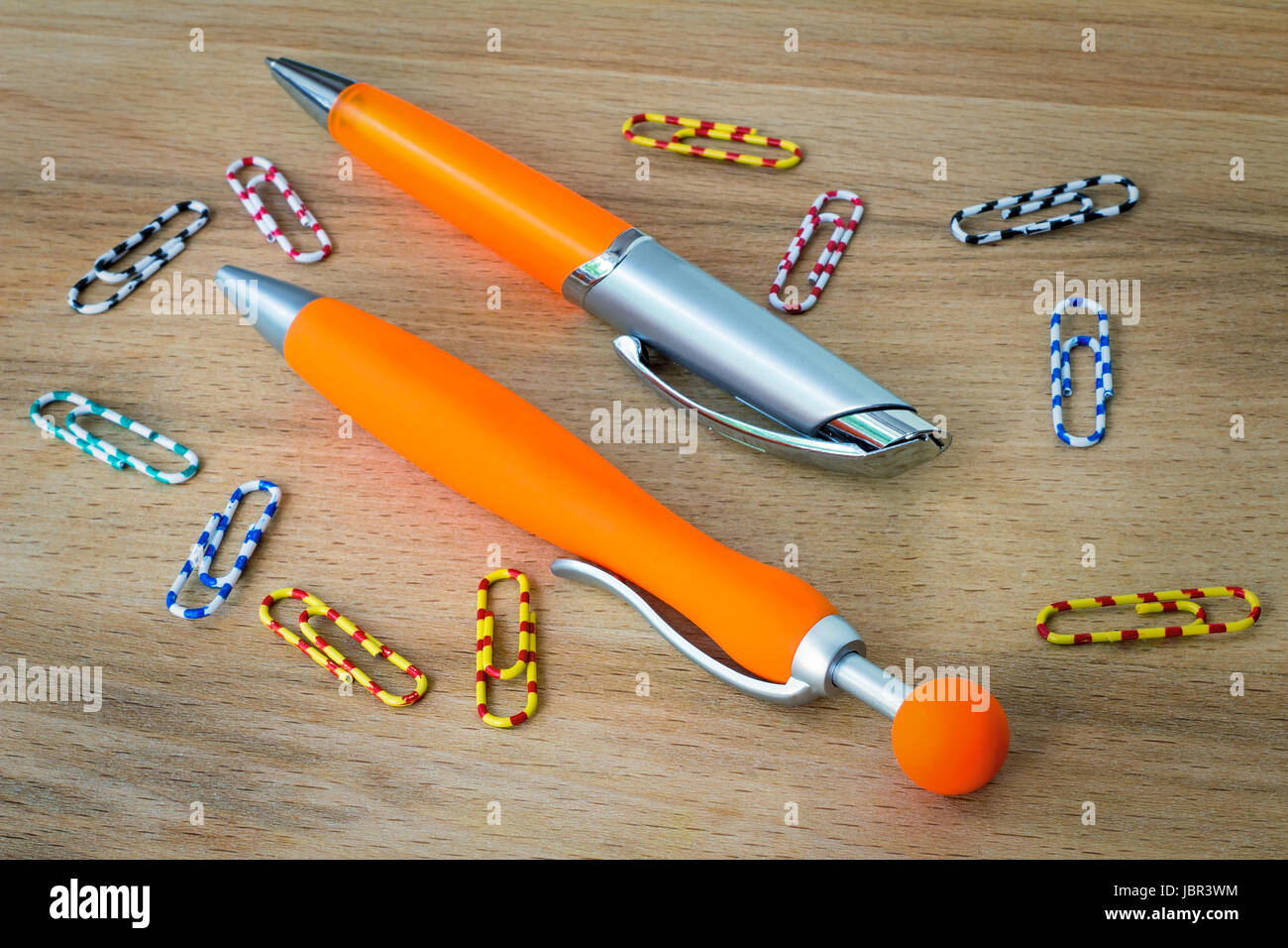Two handles of bright orange color for the letter and multi-colored ...