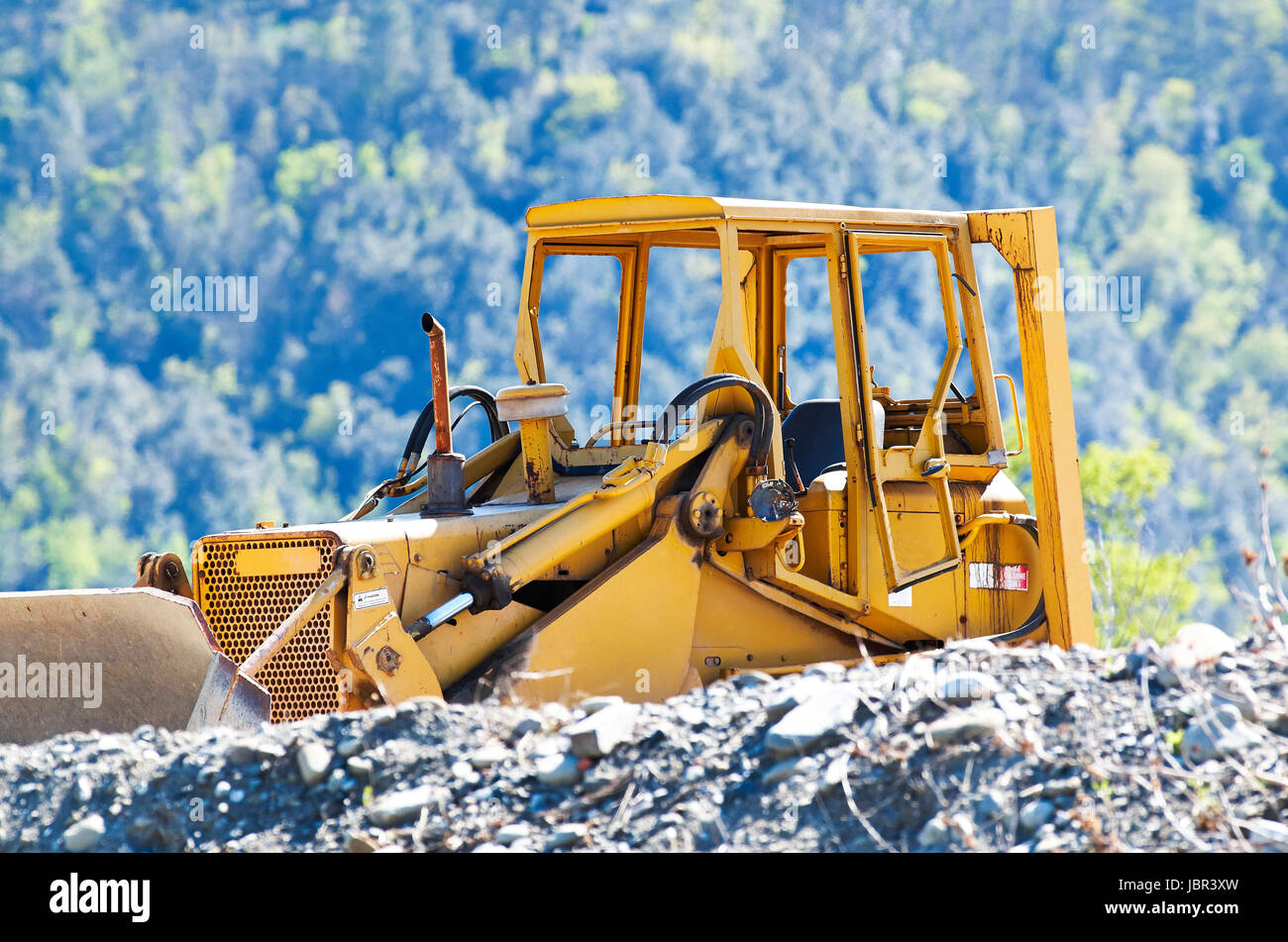digger in a quarry ready to start work Stock Photo - Alamy