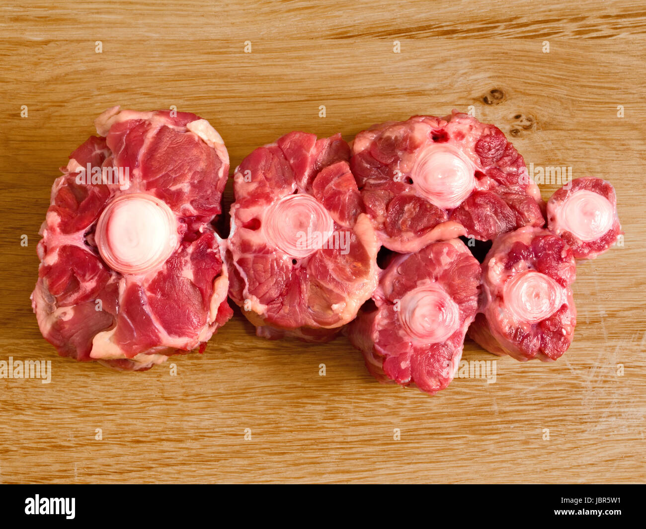 close up of raw uncooked beef oxtail Stock Photo - Alamy