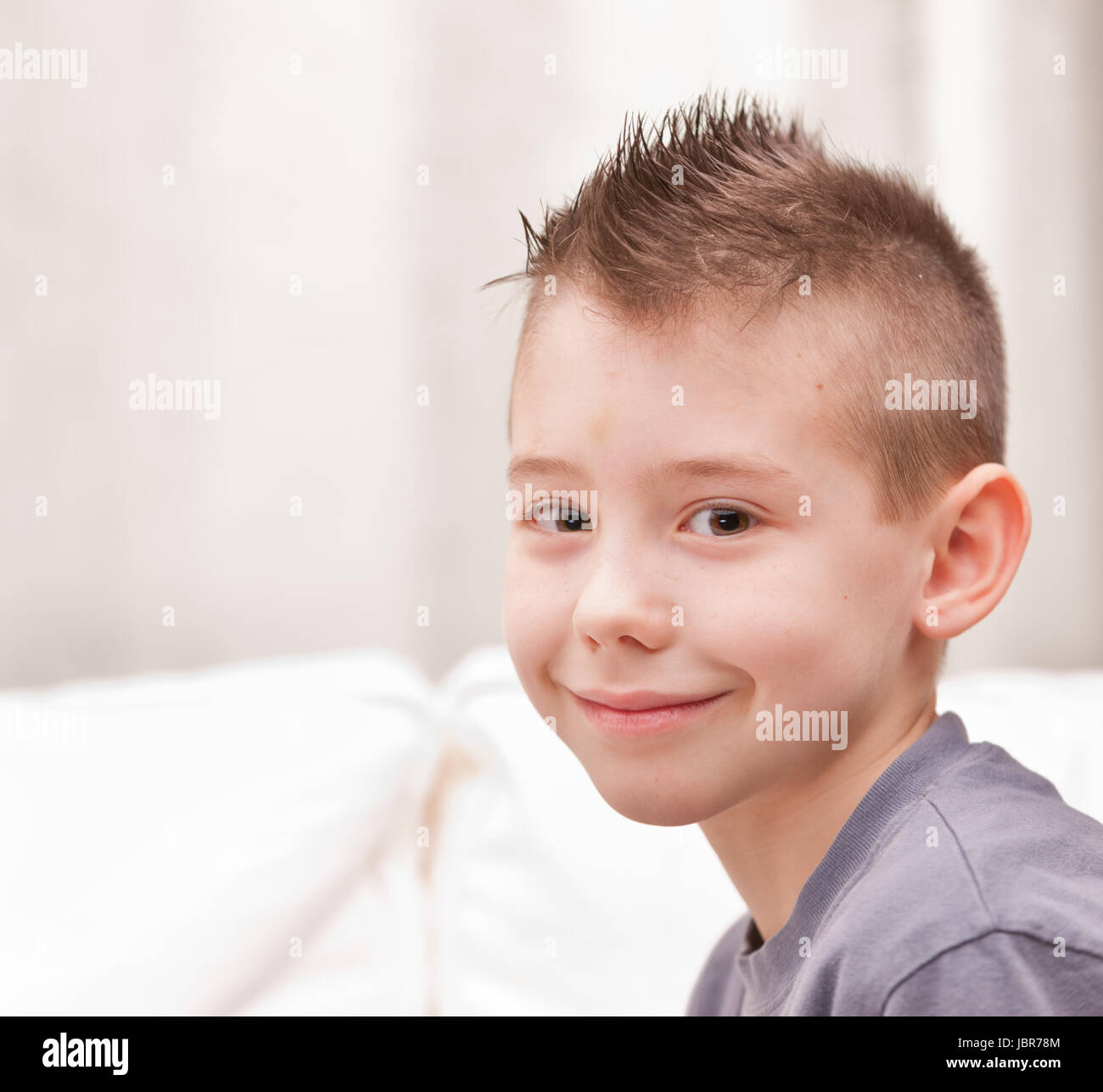 a very cute little boy smiling Stock Photo - Alamy