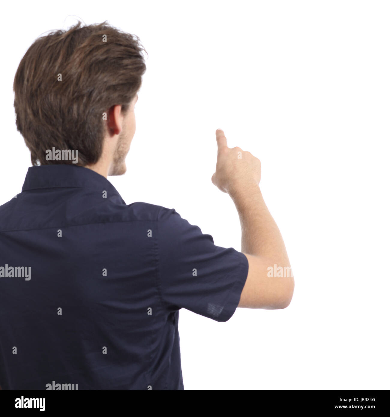 Back view of a man pushing button in the air isolated on a white ...
