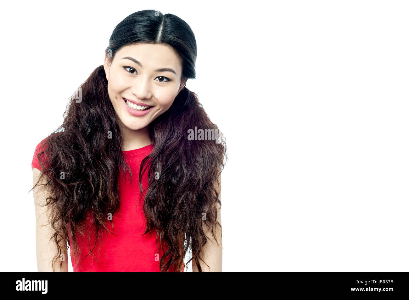 Casual young smiling girl, copy space area Stock Photo - Alamy