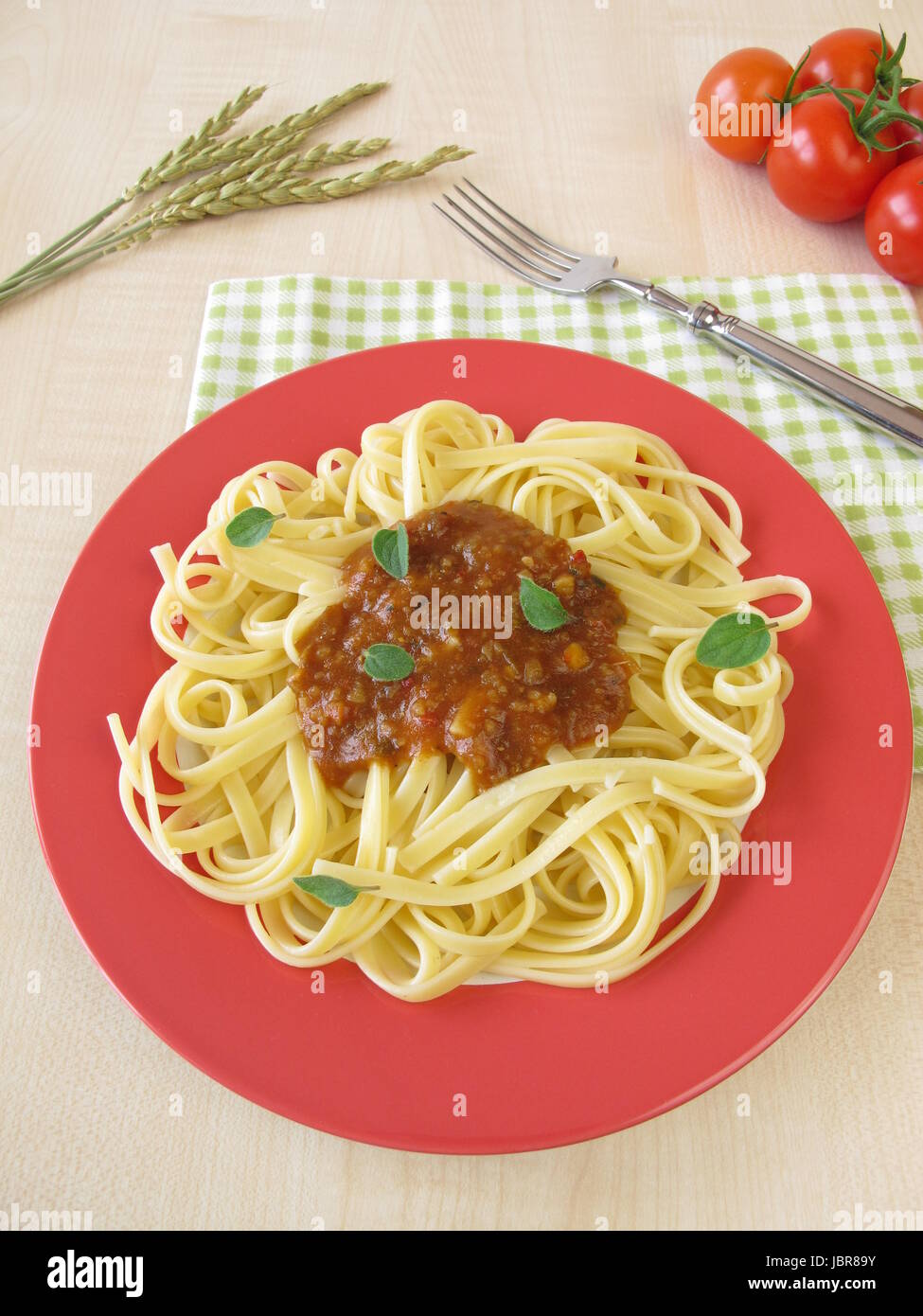 pasta with green core bolognese Stock Photo - Alamy