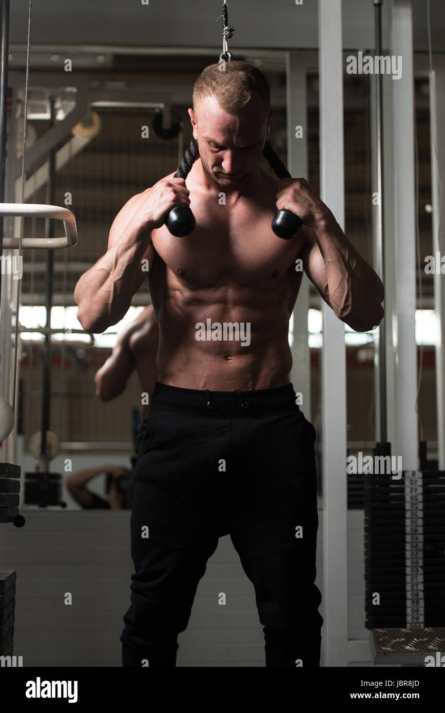 Man Athlete Doing Abs Exercise On Machine With As Part Of Bodybuilding ...