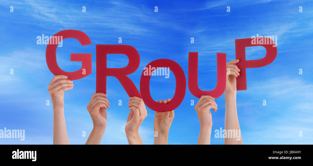 Many Hands Holding the Red Word Group in the Sky Stock Photo - Alamy