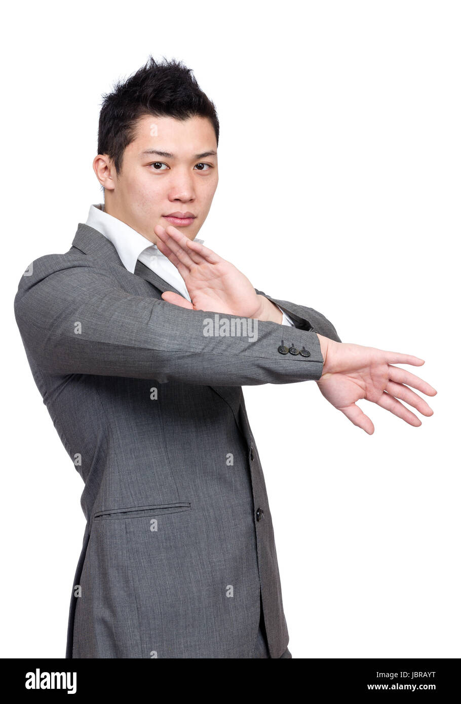 Confident businessman fighting Stock Photo - Alamy