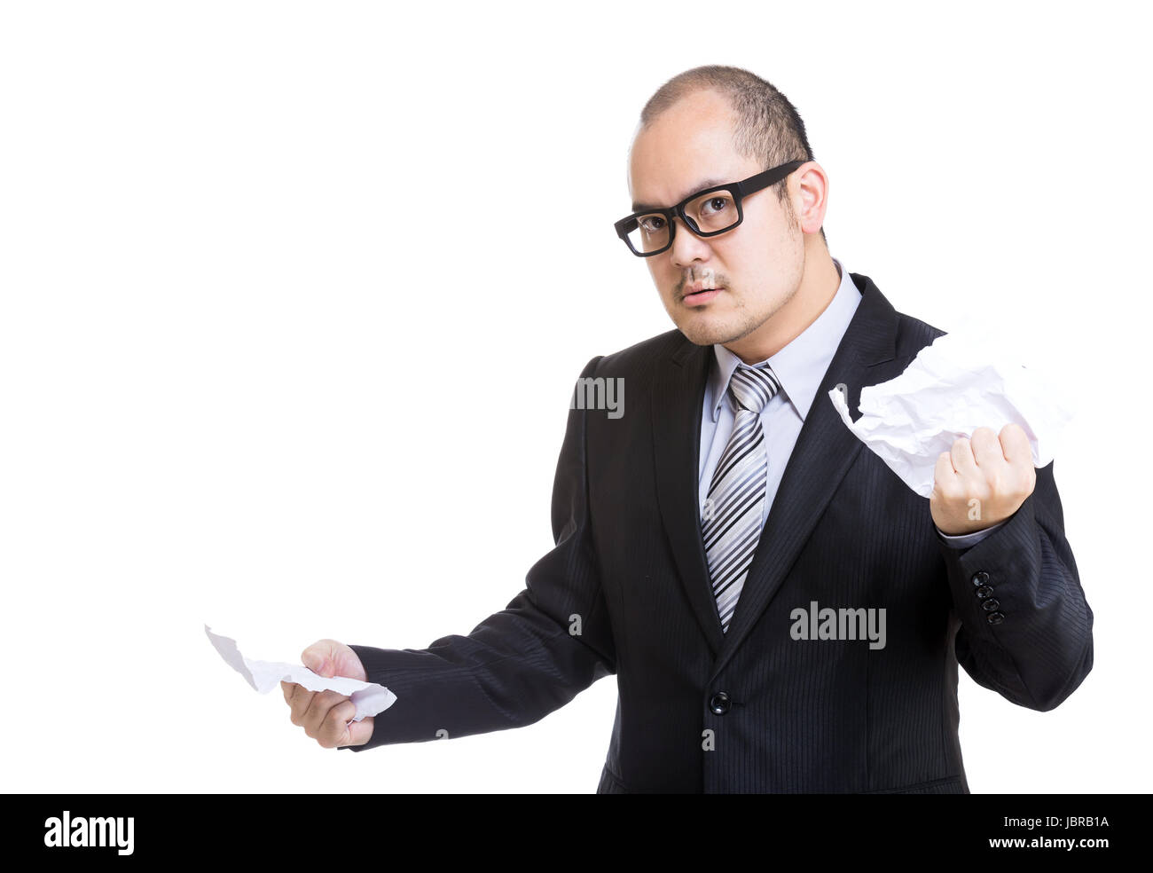 Asia businessman tear the paper Stock Photo - Alamy