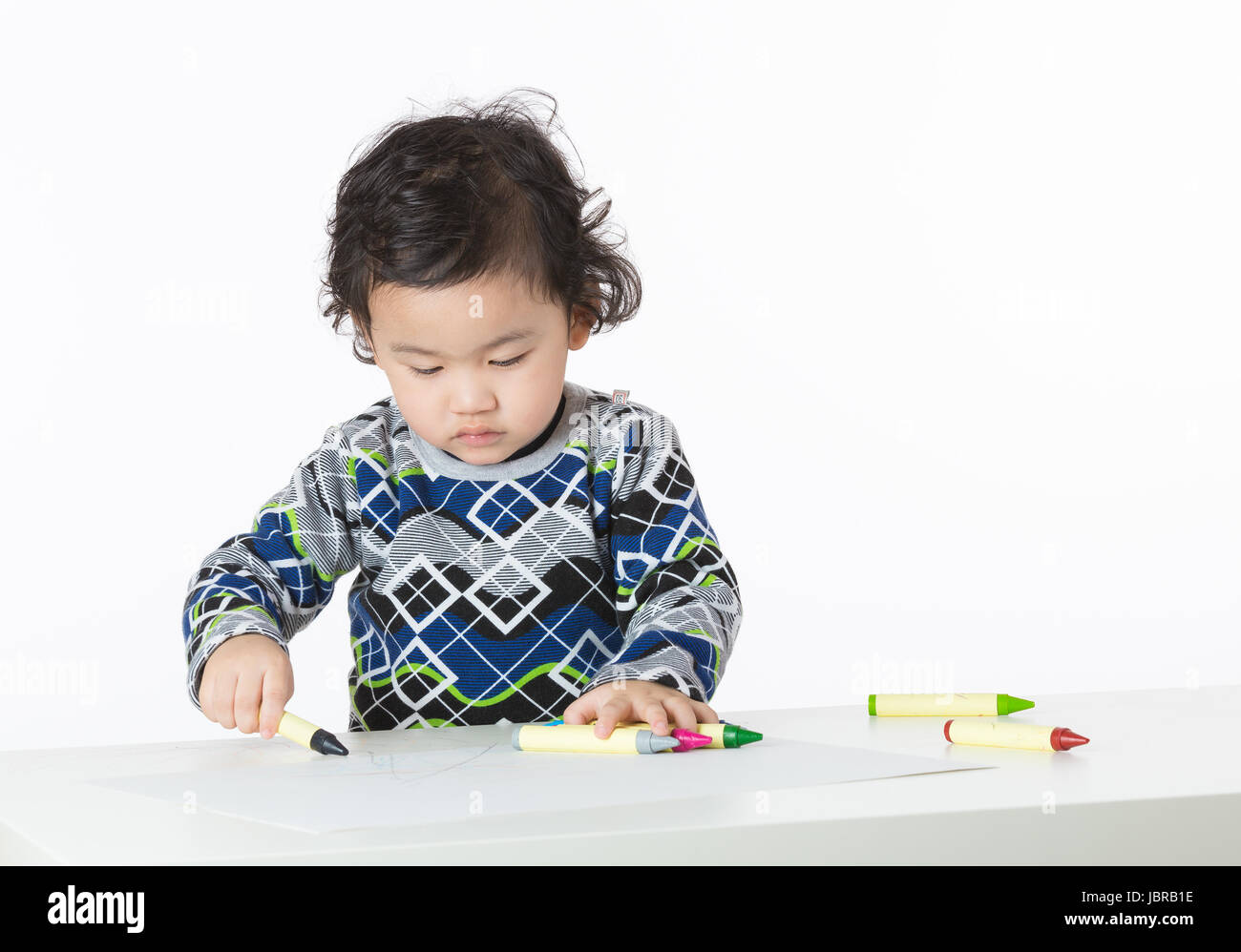 Asian baby boy drawing Stock Photo - Alamy