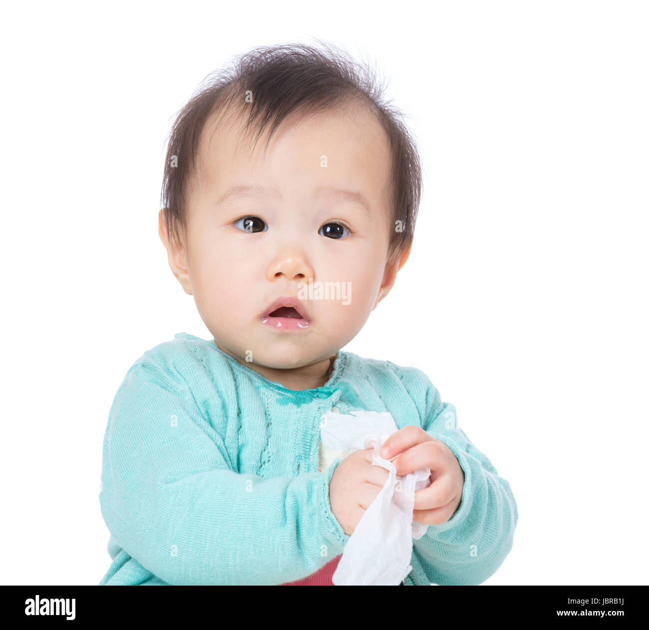 Asia baby girl play with tissue Stock Photo - Alamy